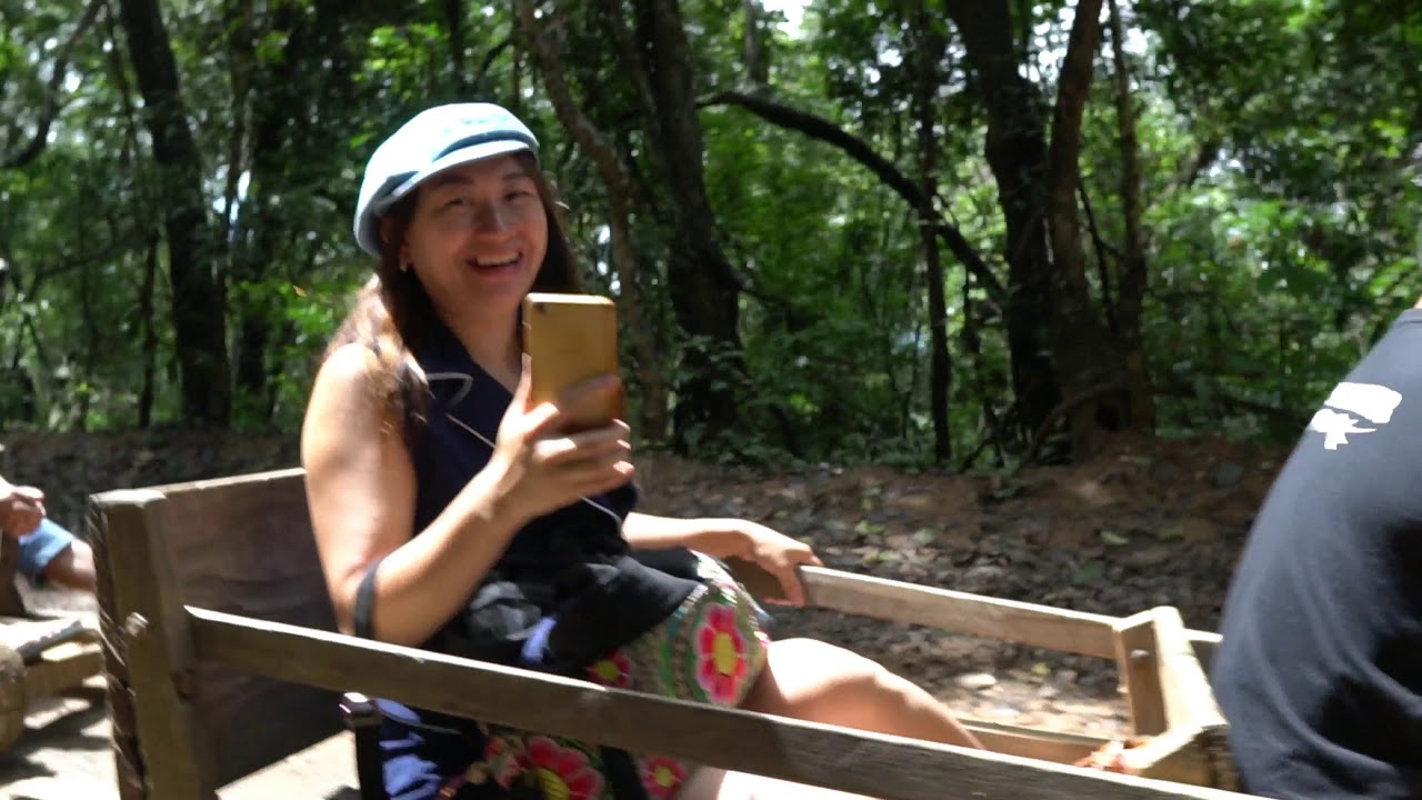 Hmong Village wooden car ride - YouTube