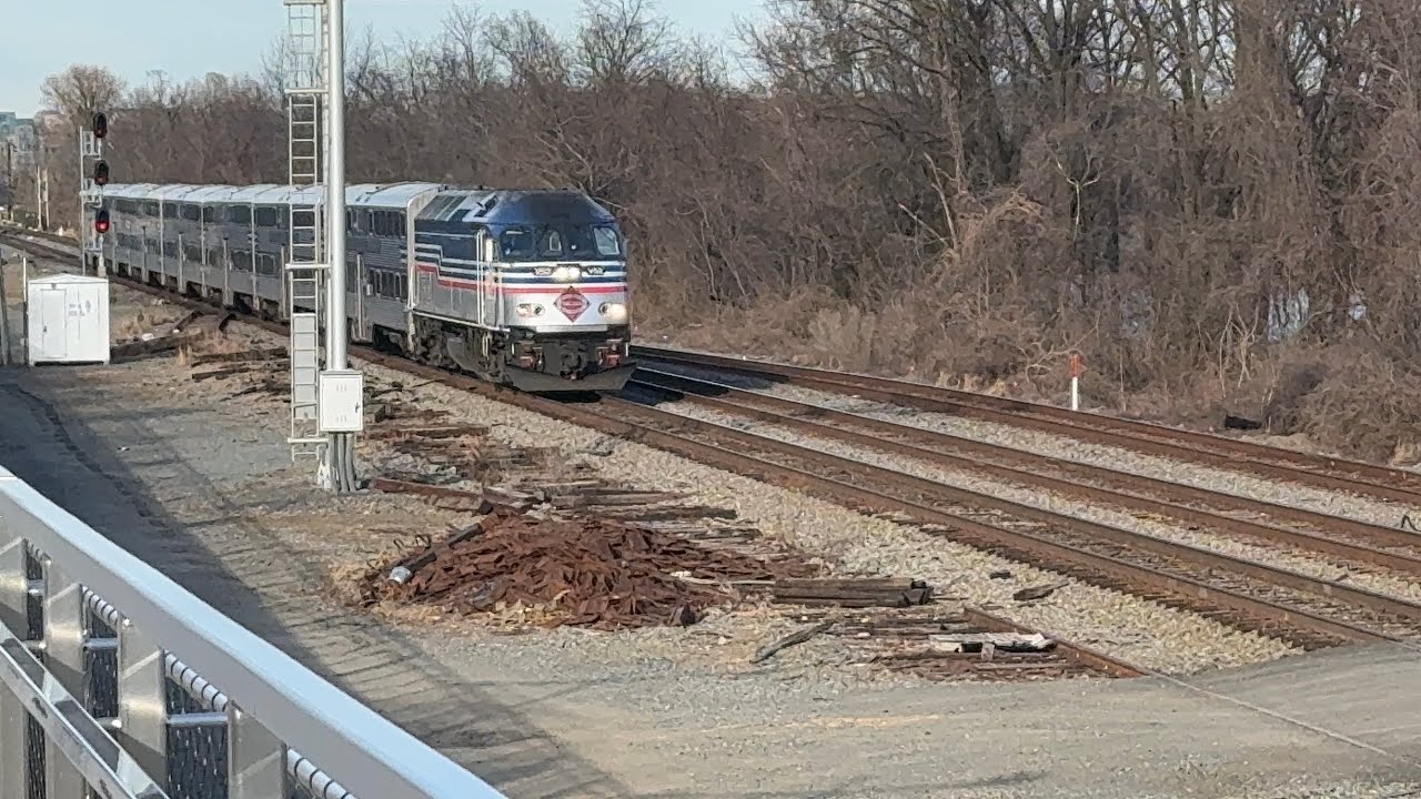V52 leads a VRE commuter train through Arlington, Va on 02:24:25 - YouTube