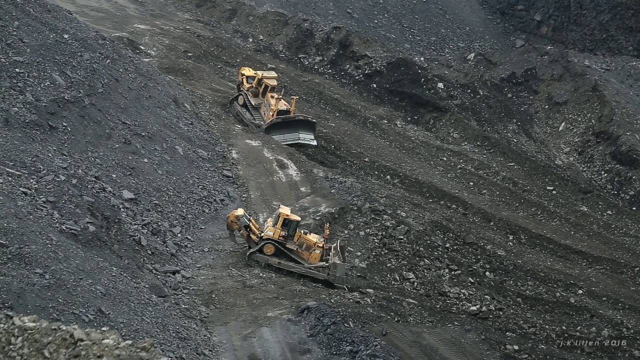 Two CAT Dozers Backfilling - YouTube
