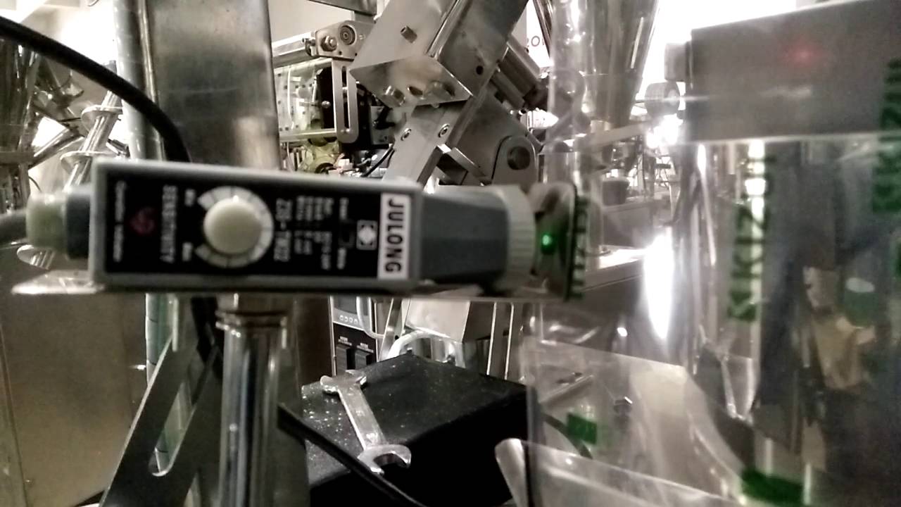 vertical packing machine sensor marking adjustment 1 - YouTube