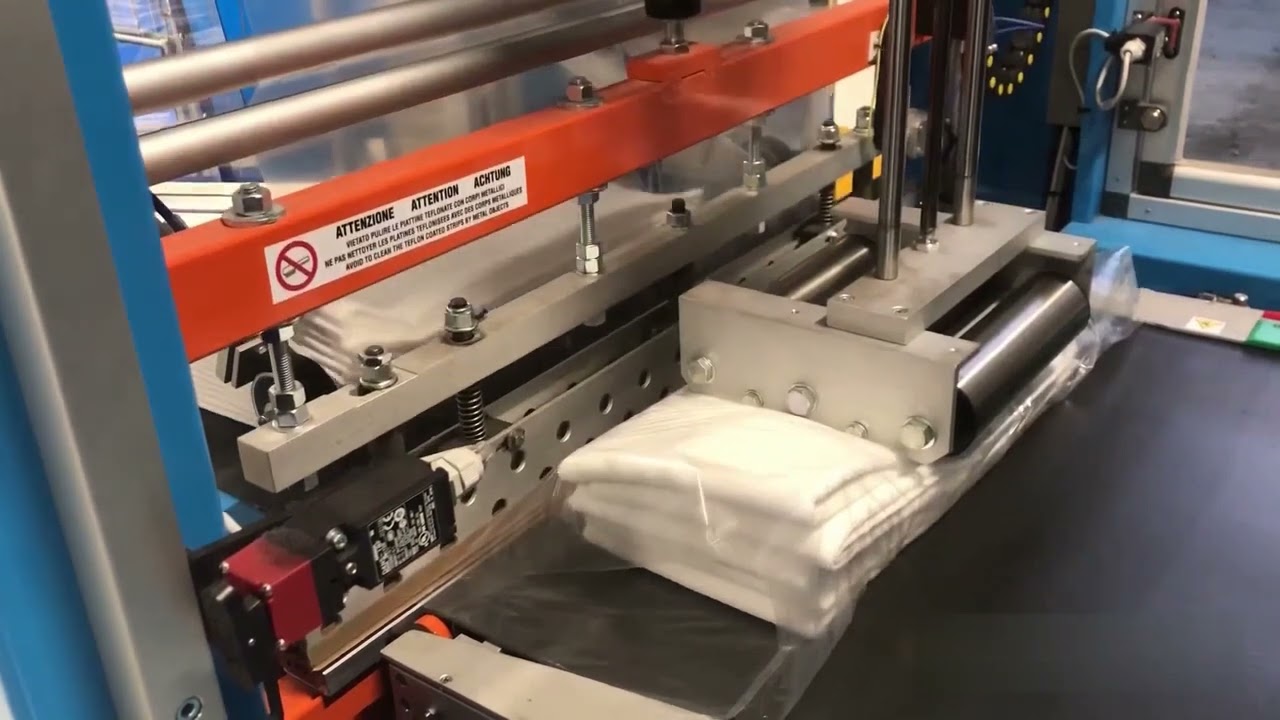 LINEN INDUSTRIAL LAUNDRY PACKER - Automatic Shrink Film-wrapper for ...