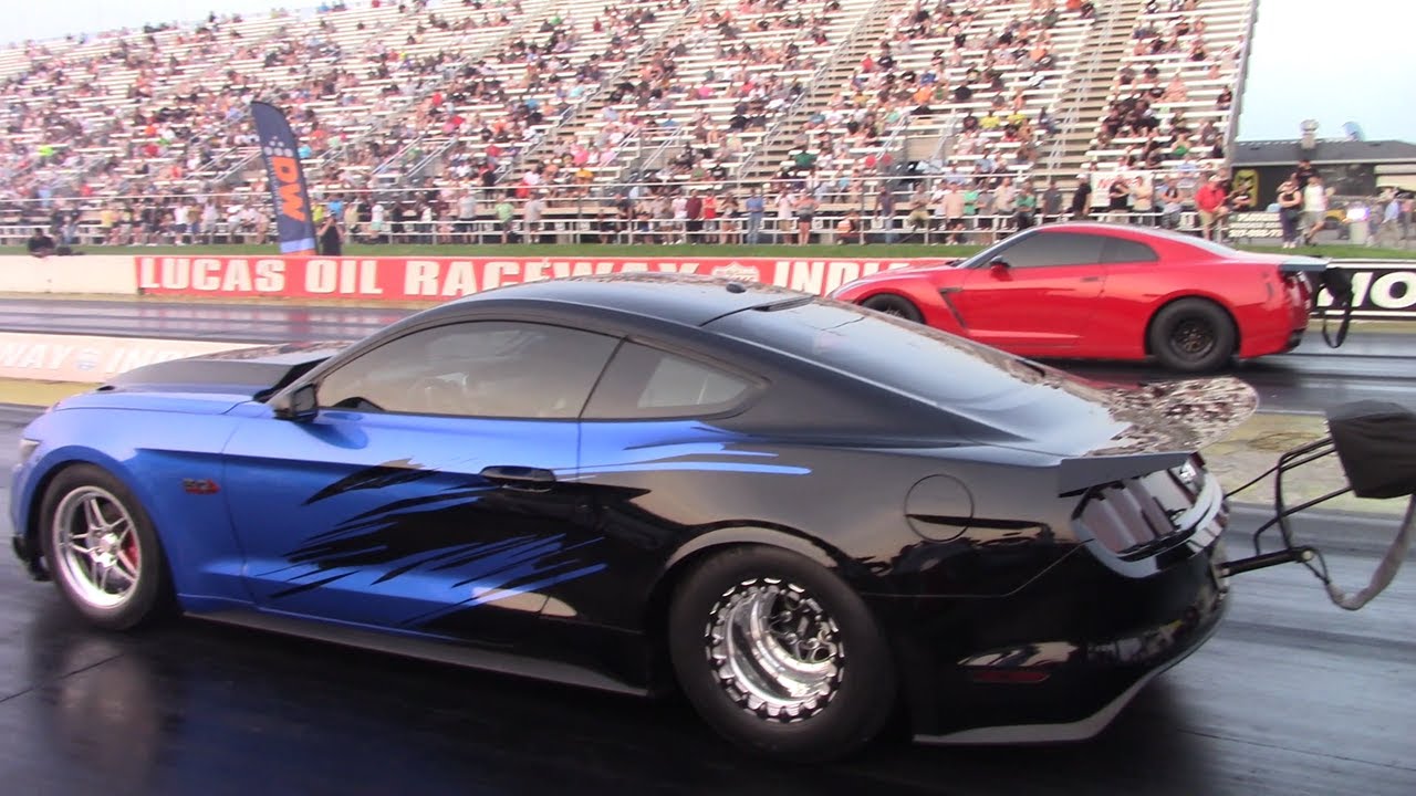 98mm Turbo Coyote Mustang at Street Car Takeover Running Mid 7s! - YouTube