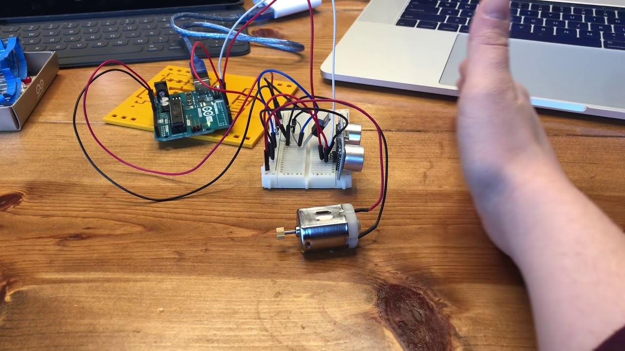 Ultrasonic sensor + DC motor proof of concept - YouTube