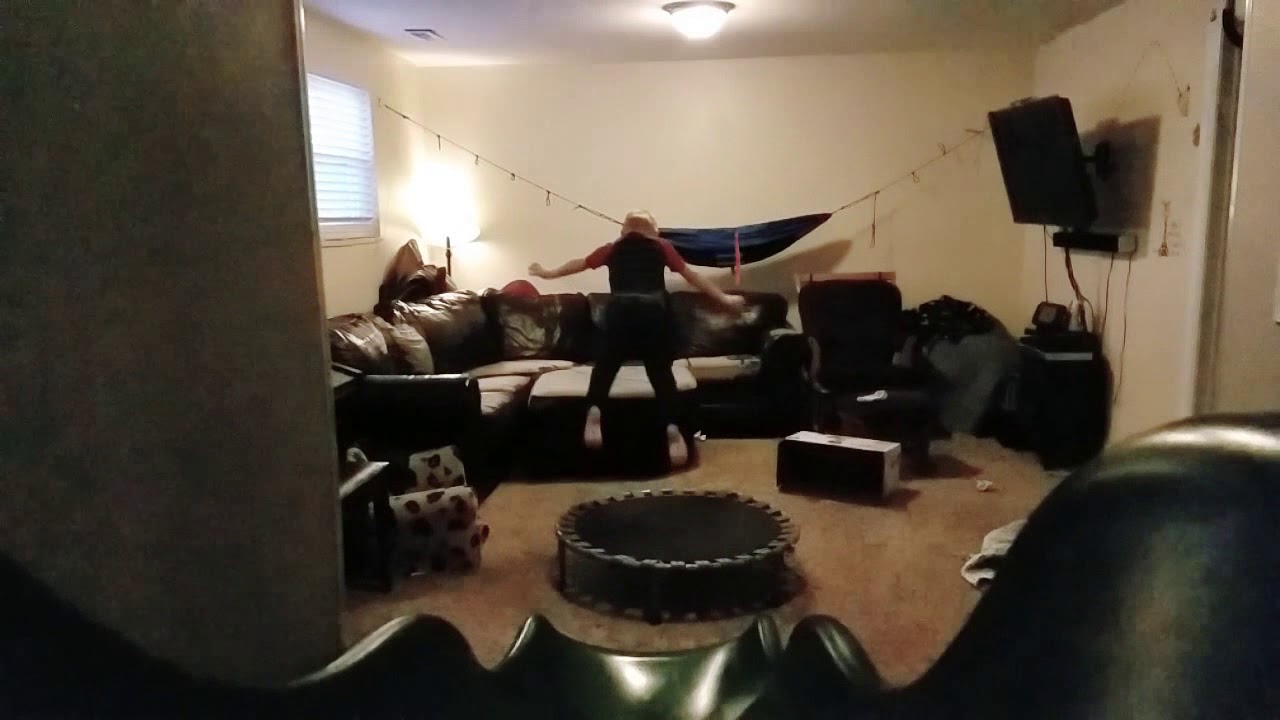 Kid jumping off trampoline onto couch - YouTube