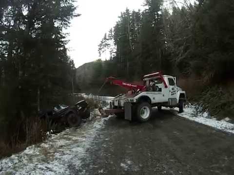 Jeep Rollover 50 feet down ravine Black Ice - YouTube