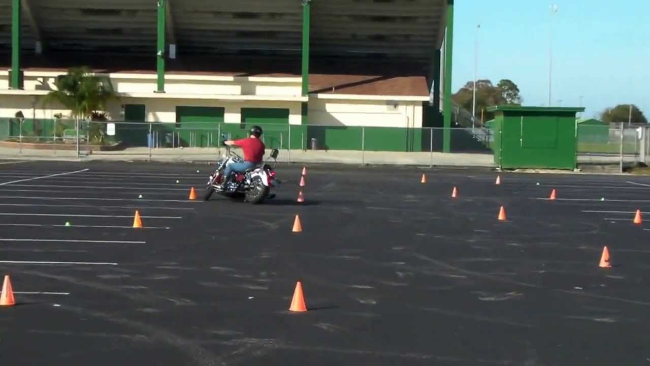 Motor officer exercise, offset cone weave, 3rd time thru - YouTube