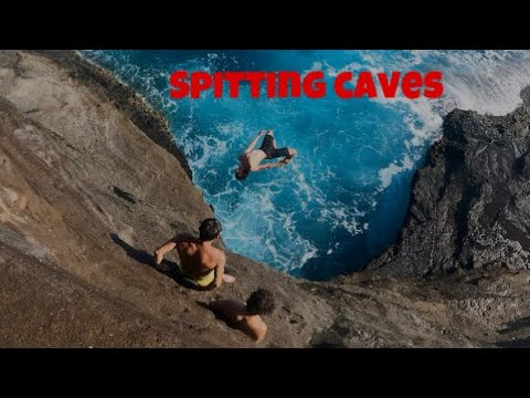 cliff jumping at spitting caves Oahu Hawaii - YouTube