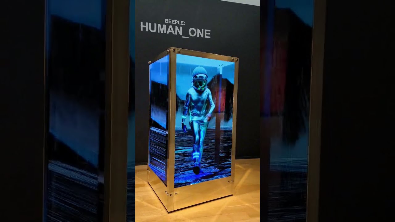 Beeple's "HUMAN ONE" NFT Sells for $25 Million - YouTube