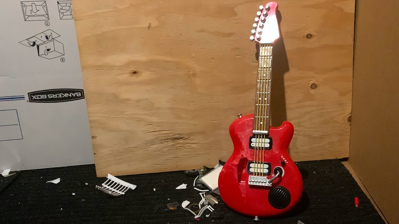 Angry Metalhead Destroys Little Tikes Toy Electric Guitar - YouTube