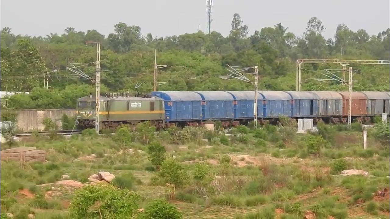 Single WAG9 powered covered wagon freight train crosses Ampere two wheeler factory - YouTube