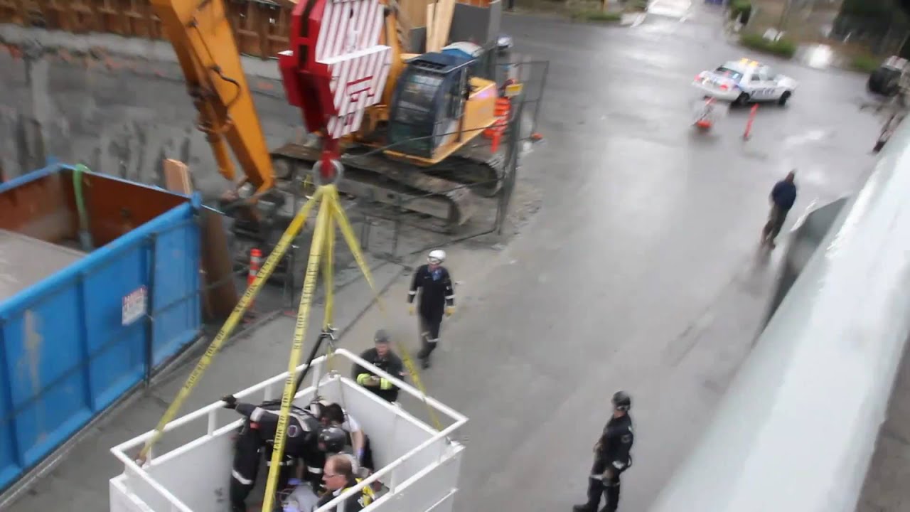 Vancouver Tech Rescue Lift Man Out Of Construction Site - YouTube