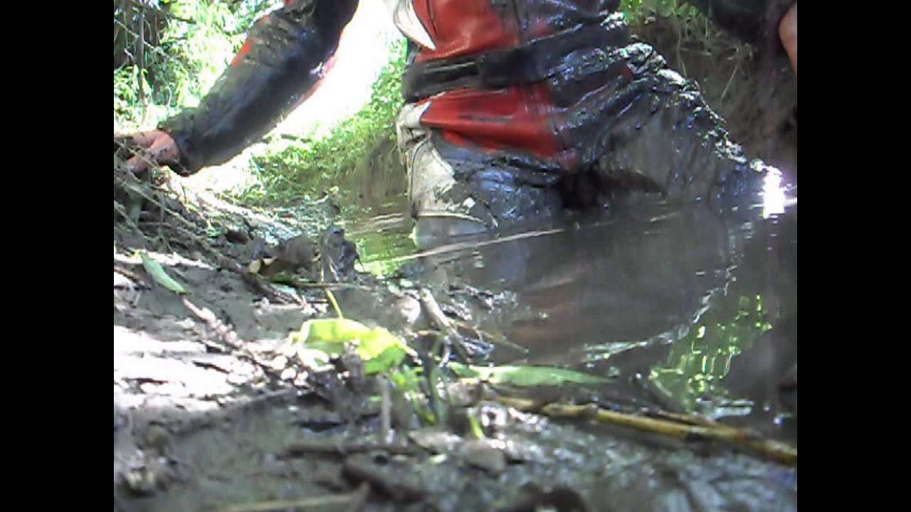 Mud wallow in leathers and boots 2 - YouTube