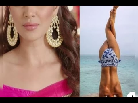 Aashka Goradia Goes Topless While Doing A Difficult Headstand Pose To Promote Nude Yoga!