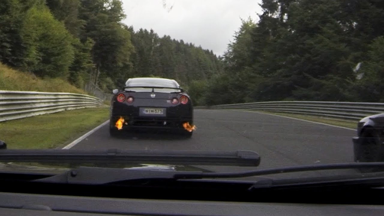 FLAMING Nissan GT-R vs Schirmer BMW M3 E92 Nürburgring Lap (7.57,18 BTG ...