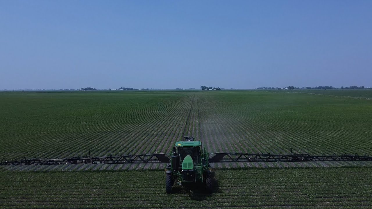 John Deere 412R Broadcast Spraying Soybean Fields - YouTube