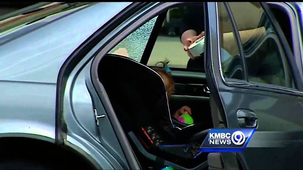 Police help save toddler trapped in car on hot day - YouTube