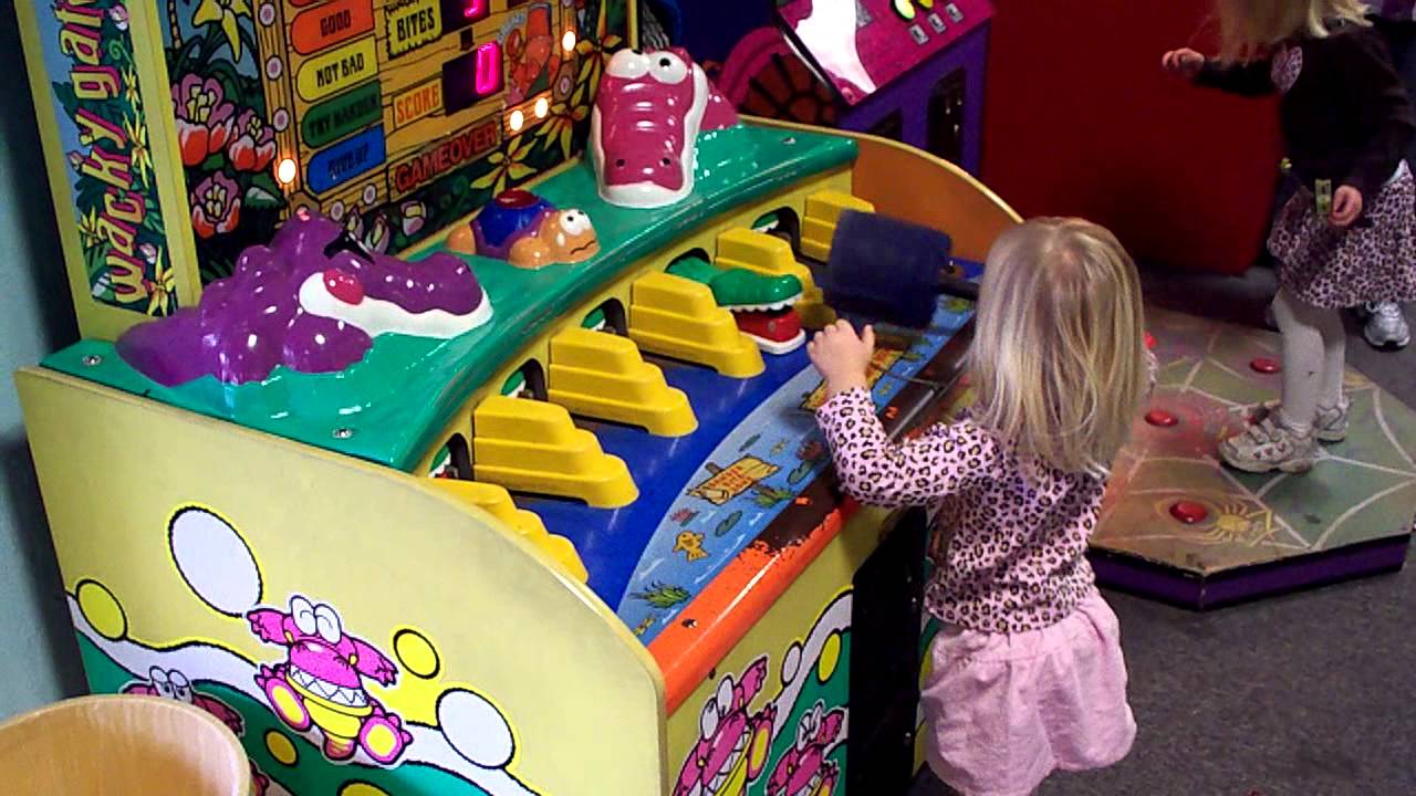Michaela plays Wacky Gator for the first time at Funspot, while Natalie ...