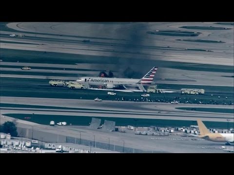 American Airlines jet evacuated in Chicago after fire - YouTube