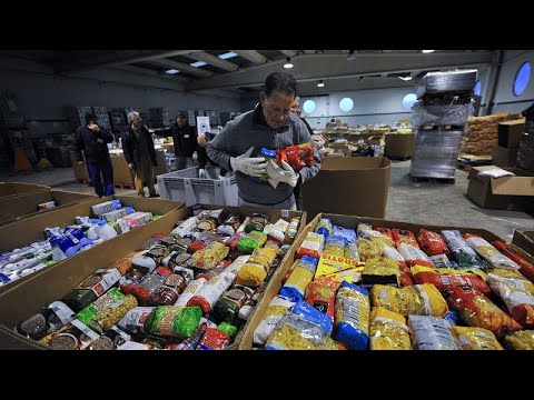 Watch: Spanish volunteers start collection drive for food banks - YouTube