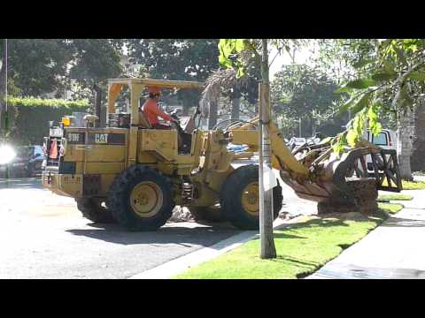 Awesome Front Loader With Huge Claw Picking up Tree stump! - YouTube