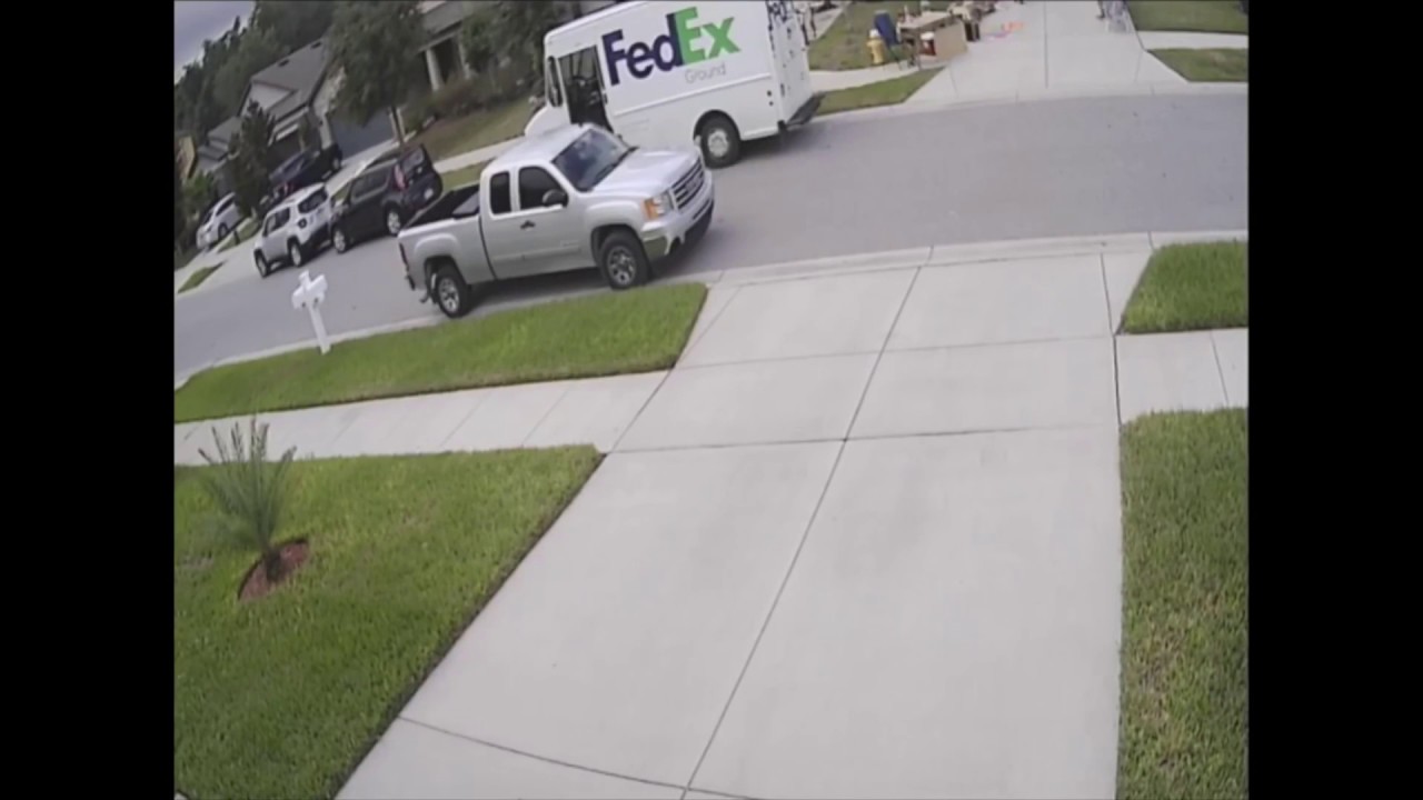 Angry FedEx Driver Throws Package With Christmas Jingle - YouTube