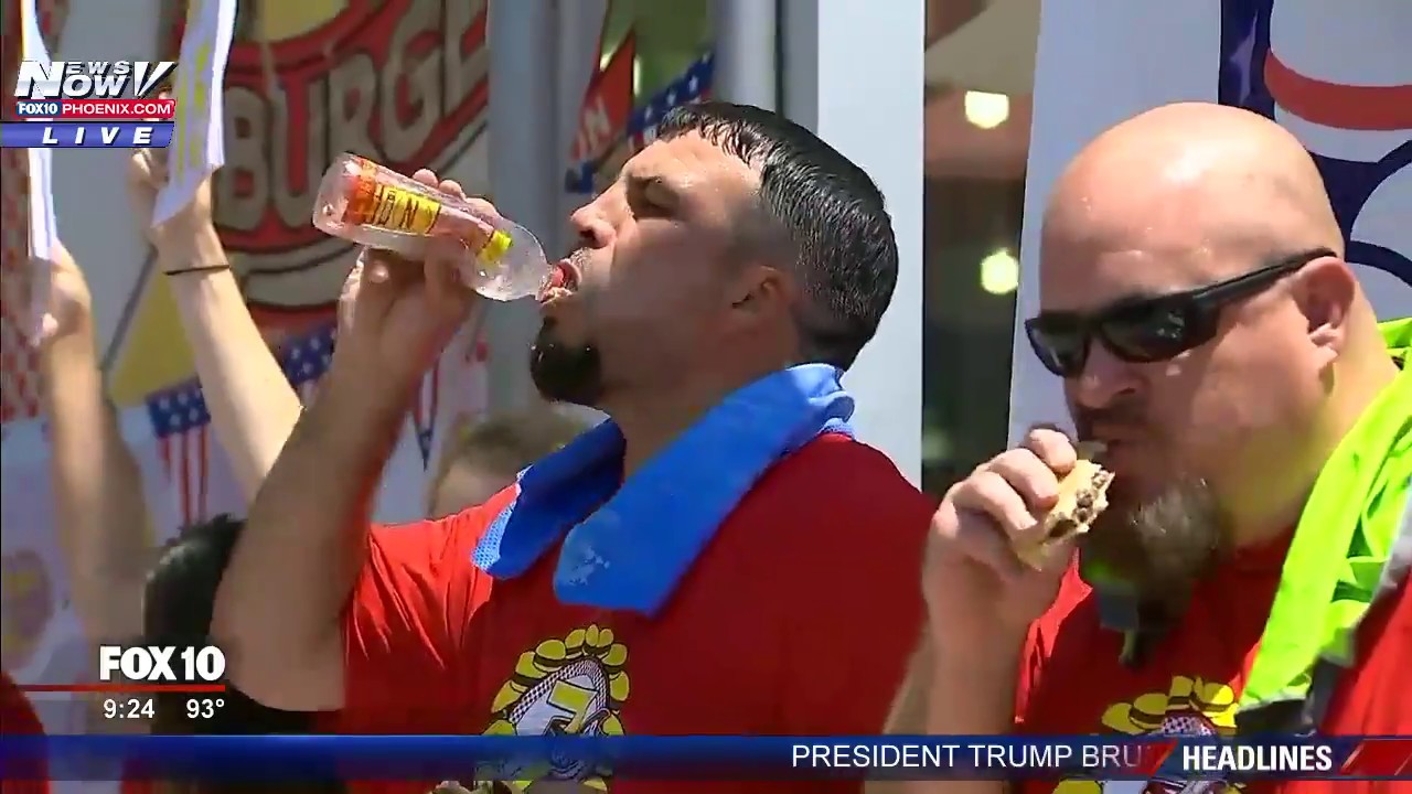 FNN: Woman Eats 21 BURGERS in 10 Min. at Burger-Eating Contest at Z ...