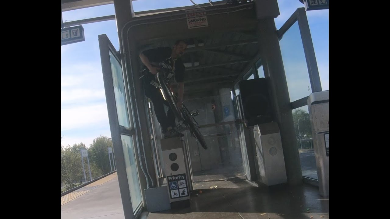 Two Fare Evaders with bicycles Climb Elevator Fare gate Bay Fair BART ...