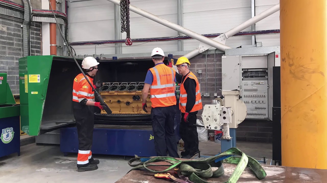 Loading a Caterpillar 3412 block into an Apollo SW1409 Spraywash - YouTube