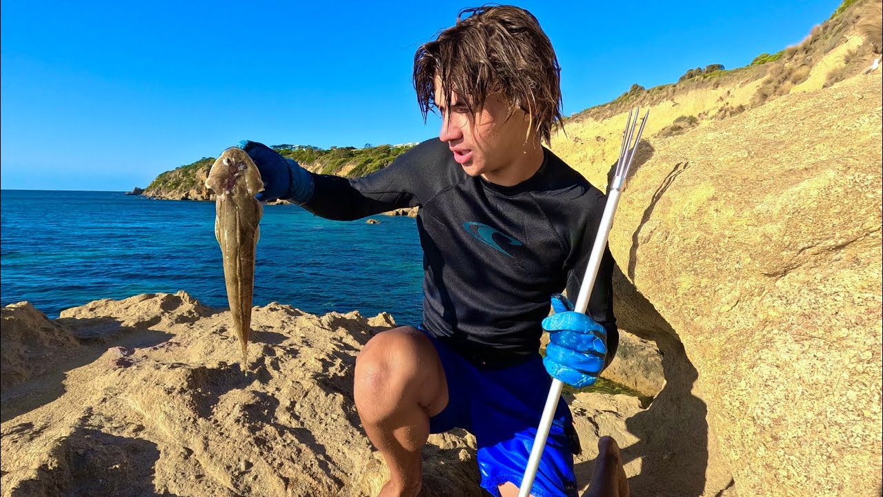Hand Spearing Flathead Cliff Side Catch And Cook - YouTube
