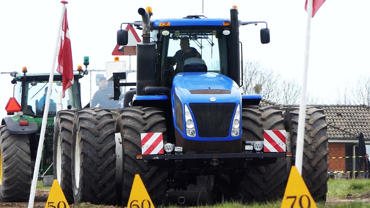 New Holland tractors in front of the sled doing some Tractor Pulling ...