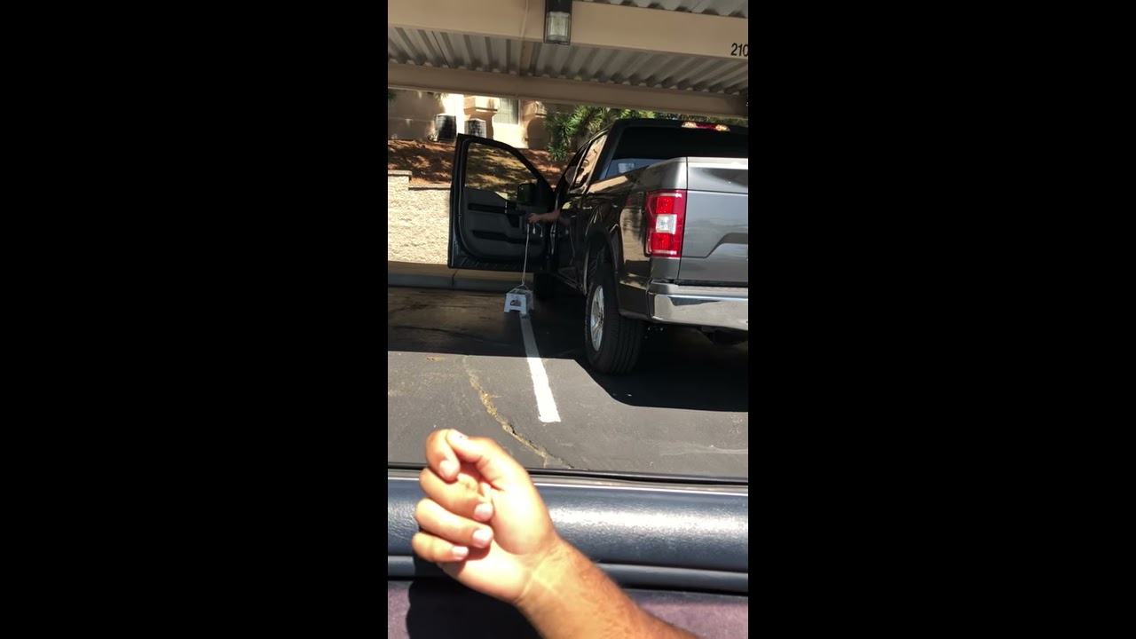 Short Woman Finds Solution to Tall Truck ViralHog