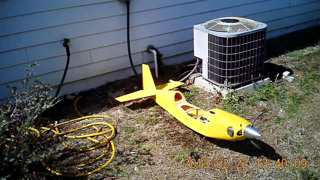 O.S. 1.08 goldberg Extra 300 R/C plane - YouTube