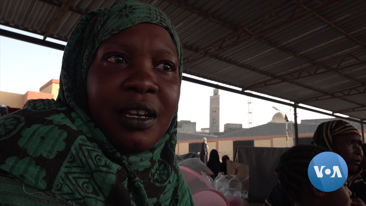 Migrants in Libya: Homeless, Detained But Determined - YouTube