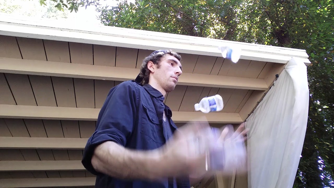 Juggling water bottles - YouTube