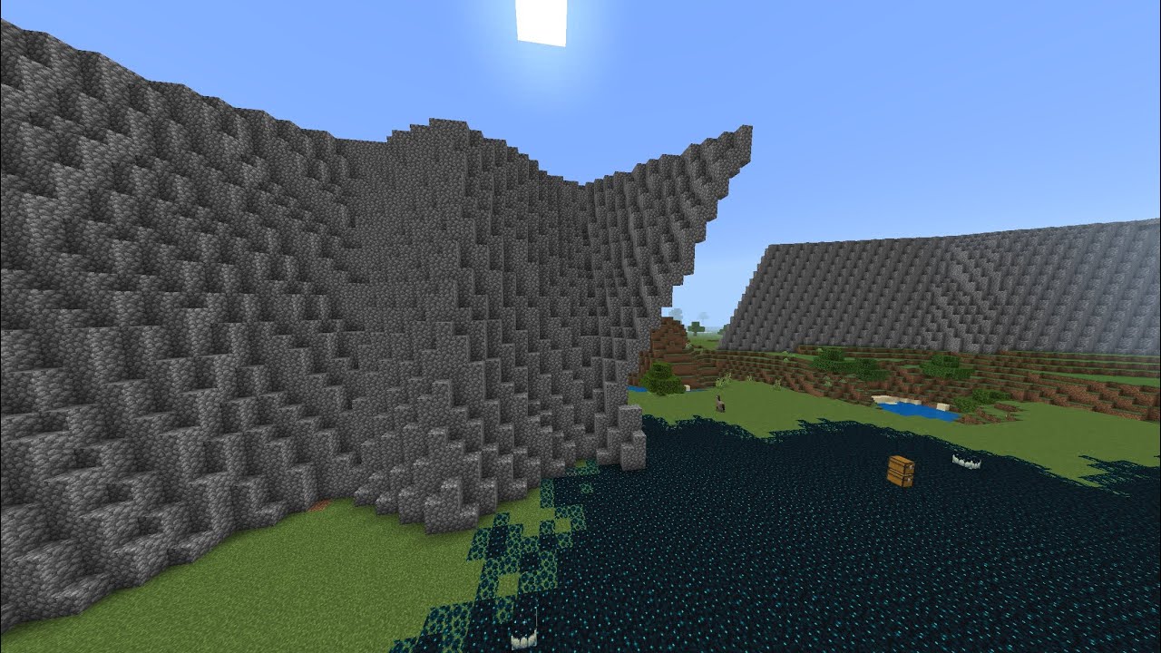 Continuing the haunted house biome mountain range in my survival world ...