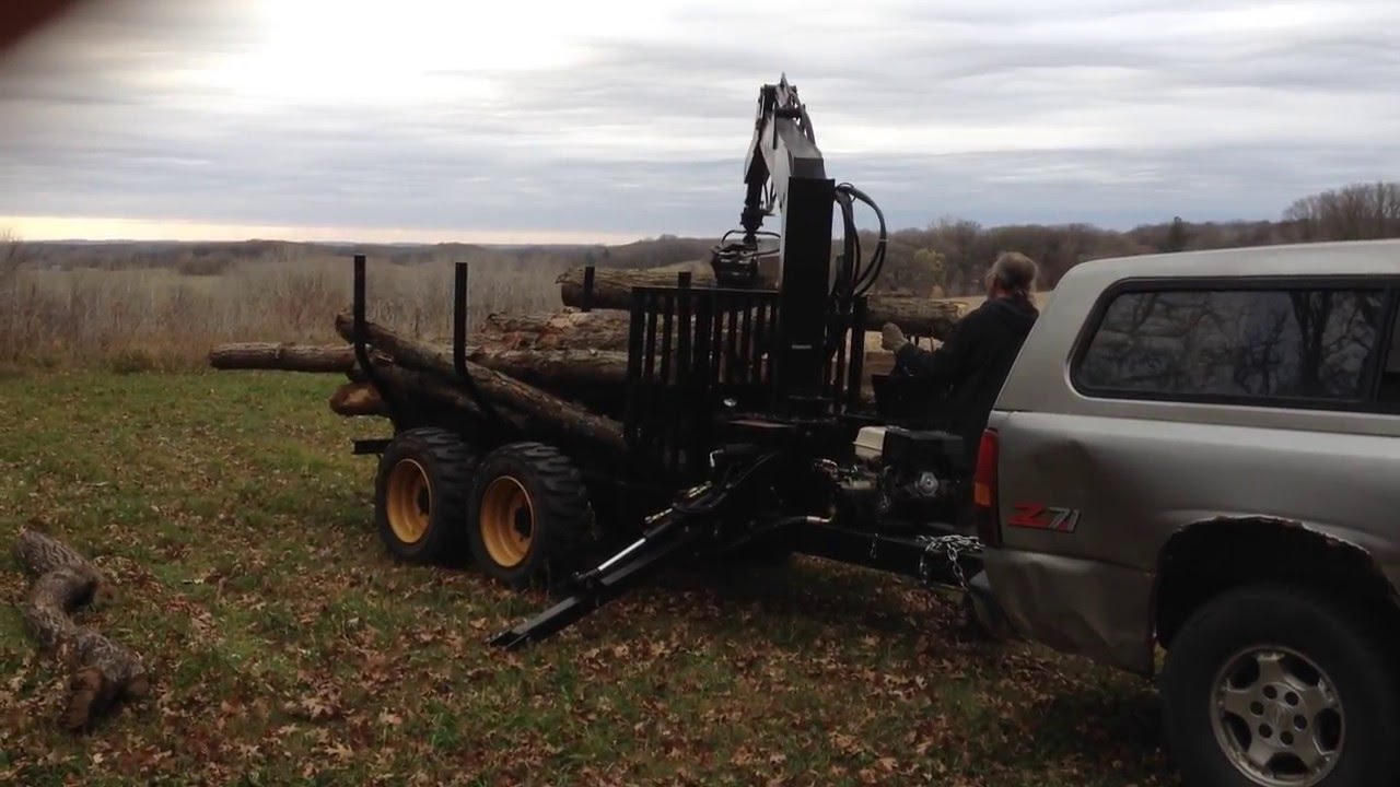 log loading trailer Euroking machinery - YouTube