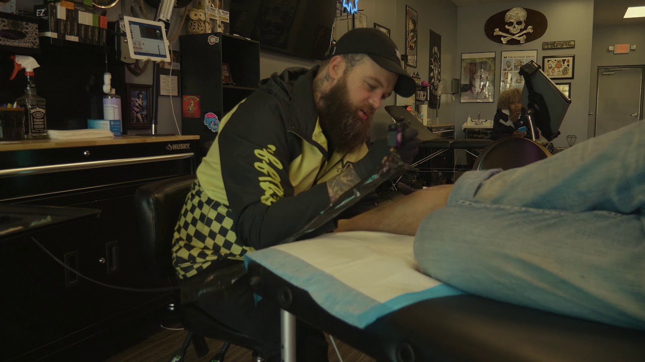 TRIUMPH TATTOO COMPANY - YouTube