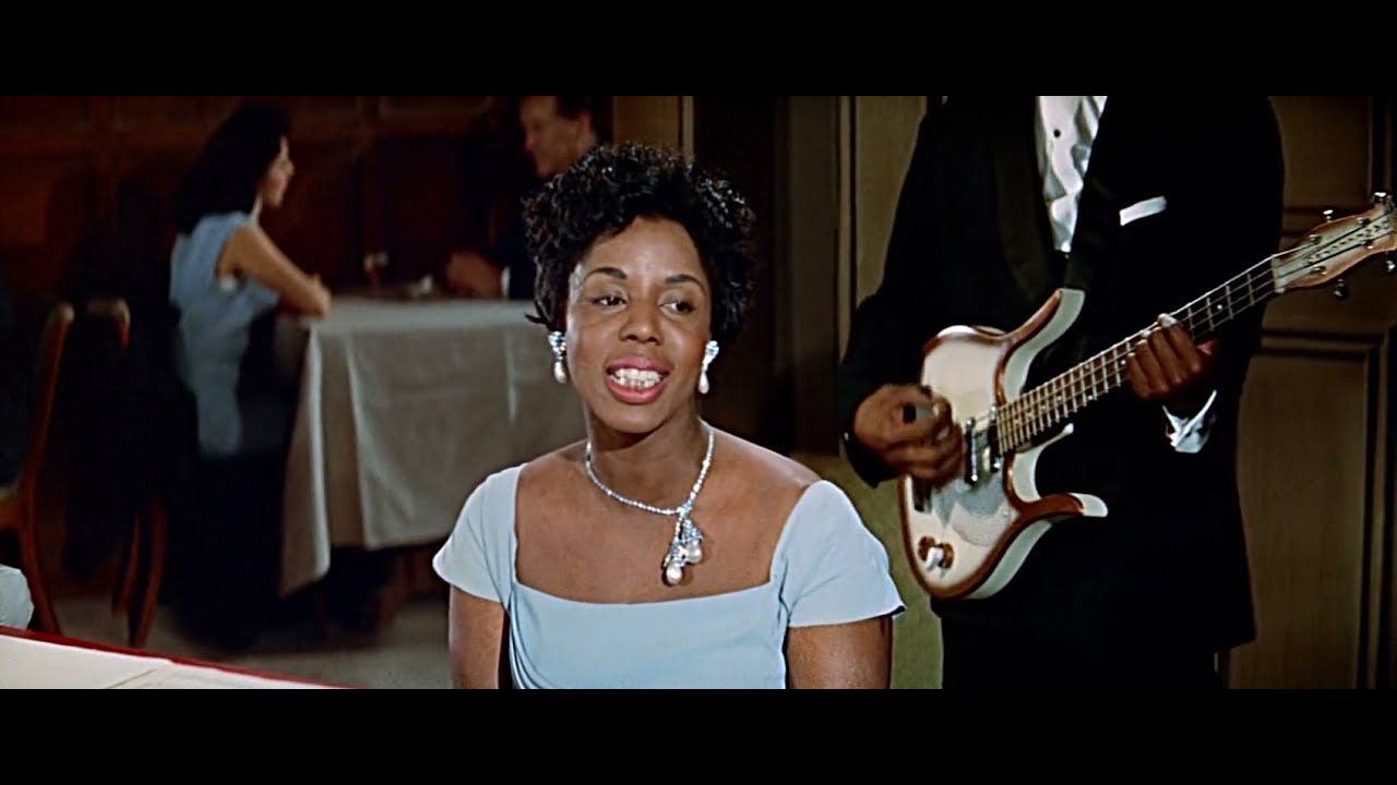 After "Roly Poly" Played and Sung by Perry Blackwell, She sings part of ...