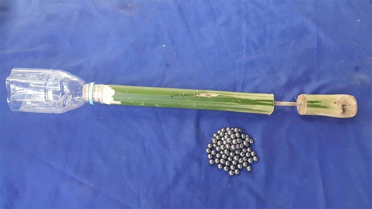 How to Make a Bamboo Gun that shoots Fruit bullets (Kamplok) Khmer ...