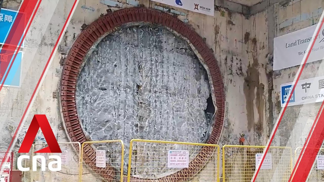 Boring tunnel breakthrough for Singapore's North East MRT Line - YouTube