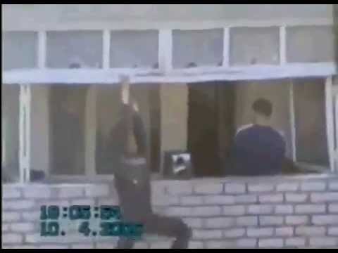 dumb russian falls off building - YouTube