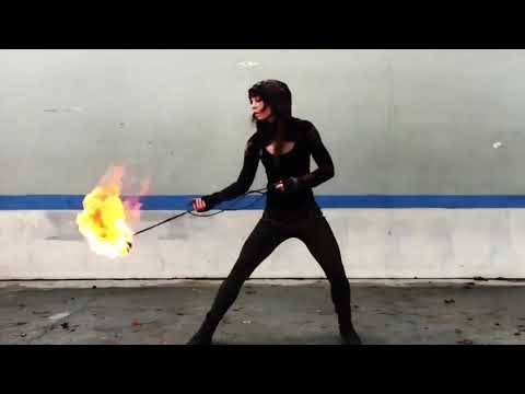 Woman Does Tricks with Flaming Rope Dart - 1020827 - YouTube