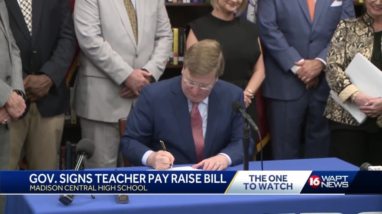 Governor signs teacher pay raise bill - YouTube