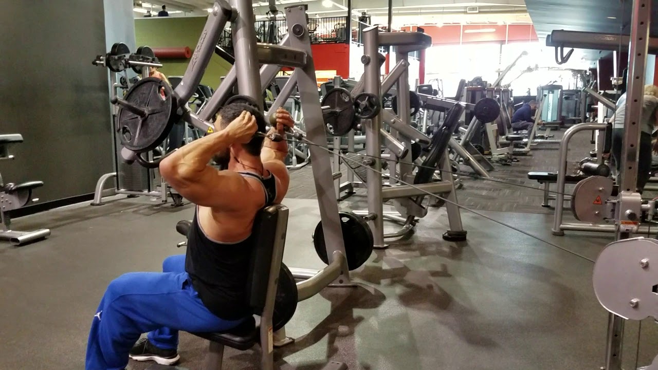 Seated crossover tricep extension - YouTube