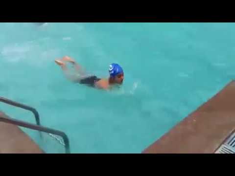 A Boy With No Hand Is Swimming In The Pool Fast Than Normal Boys.