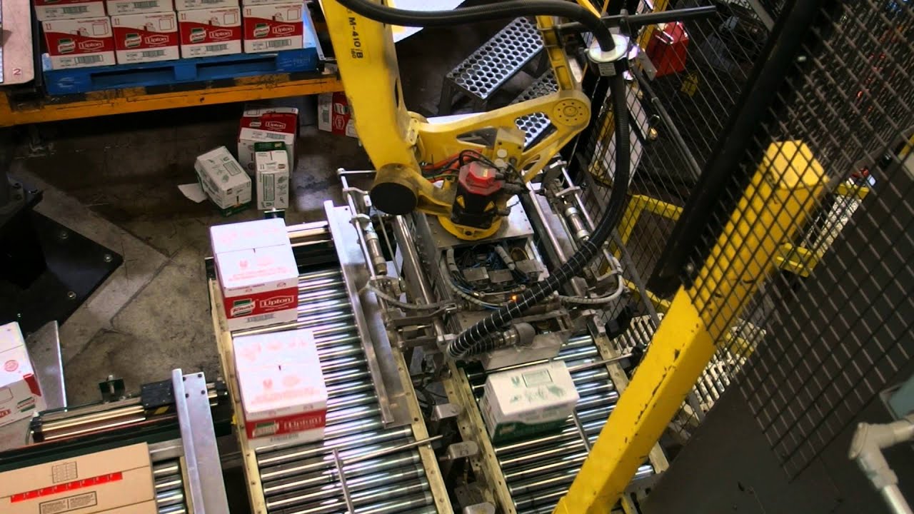 Fanuc R-30I Robotic Palletizer with 4 Position Turntable Cell 3 - YouTube