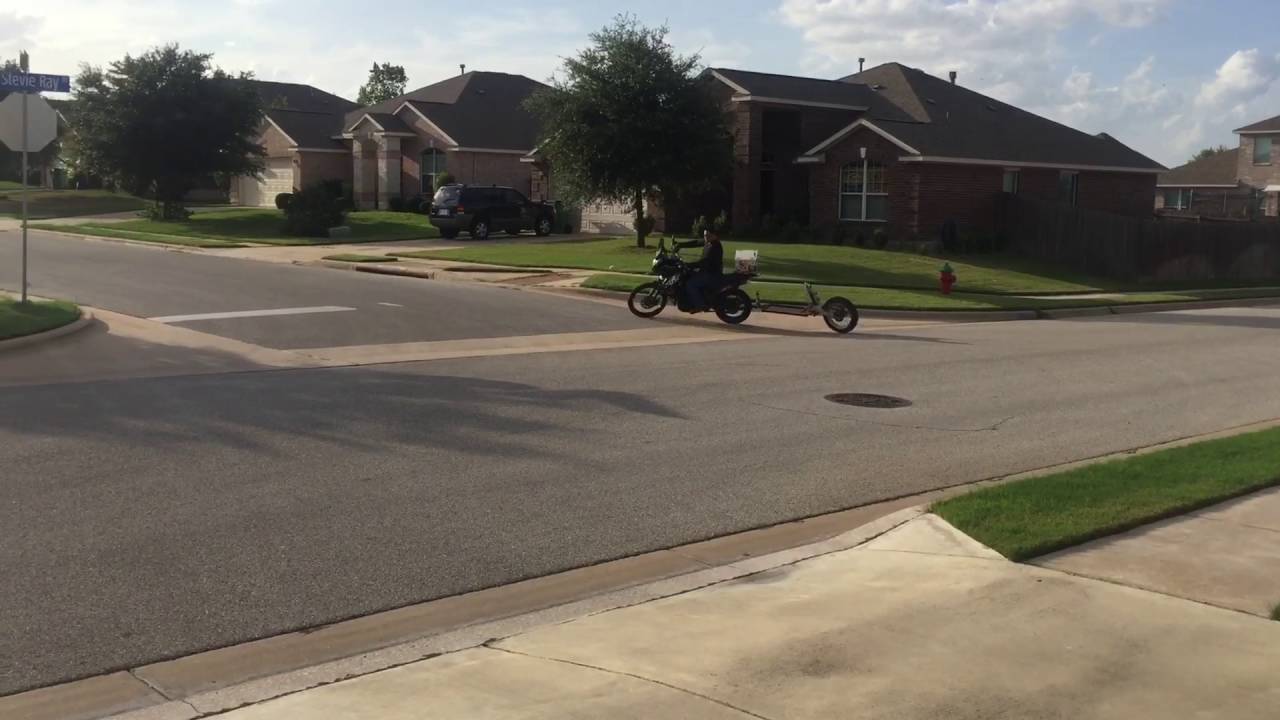 KLR 650 with a single wheel adventure trailer - YouTube