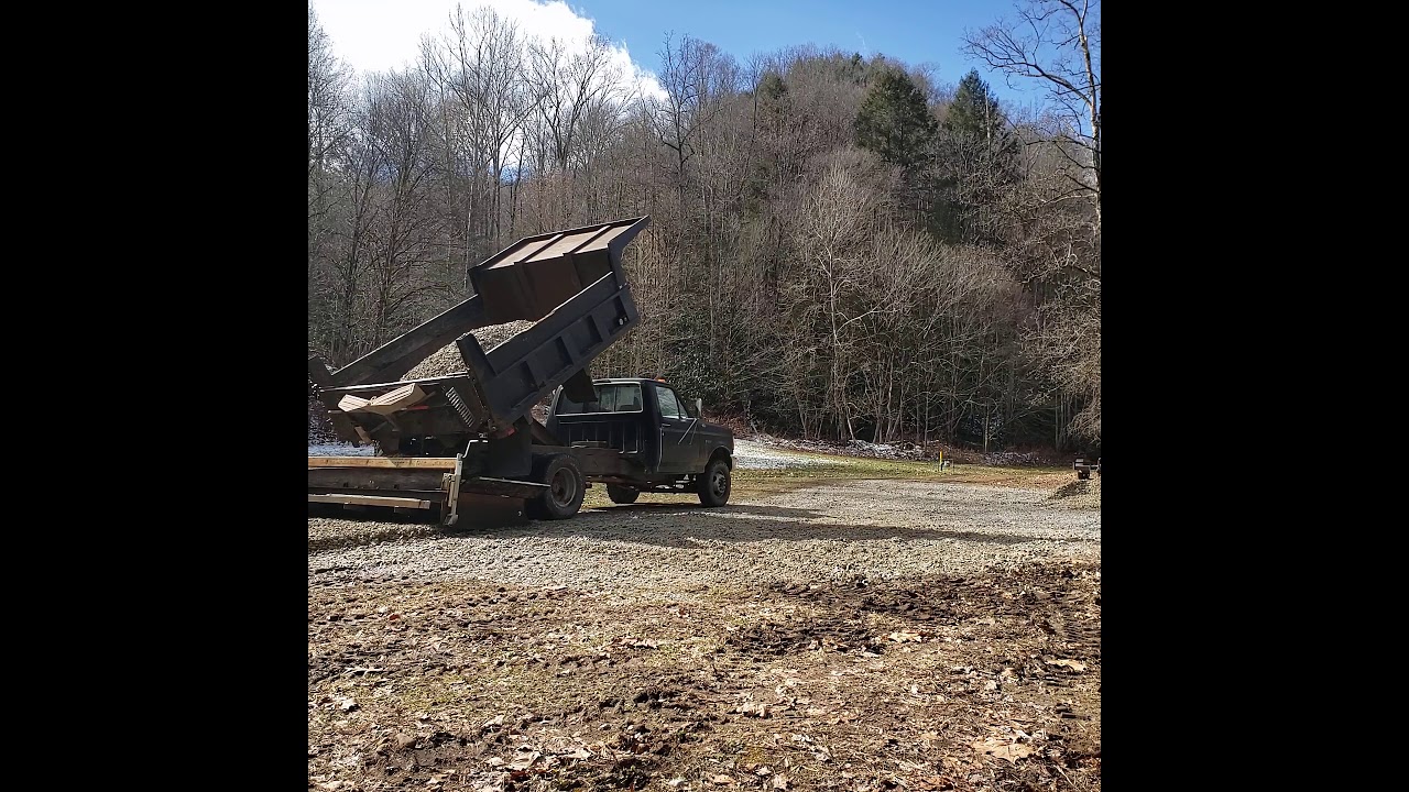 homemade dragbox spreading gravel - YouTube