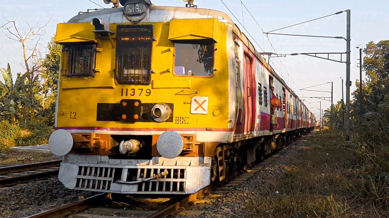 The local train enters the station on a beautiful afternoon | Howrah ...