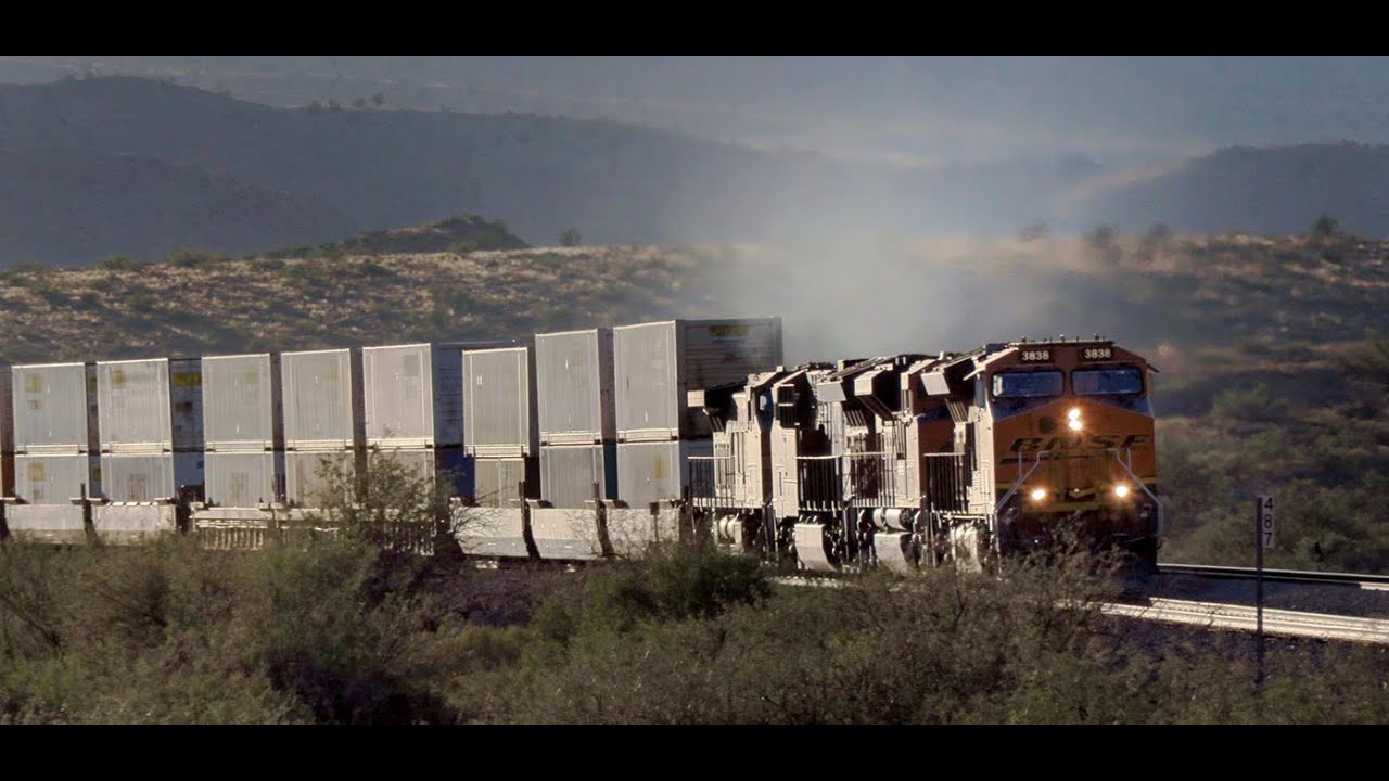 Heat! Dust! Exhaust! Noise and glint! 4-leader Z train moving EB fast ...